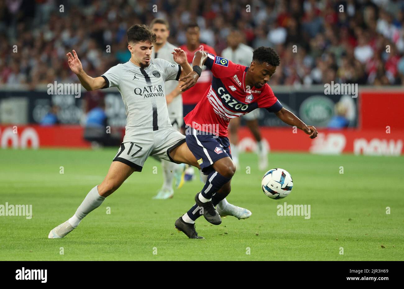 Lille, France - August 21, 2022, Angel Gomes of Lille, Vitinha of PSG ...