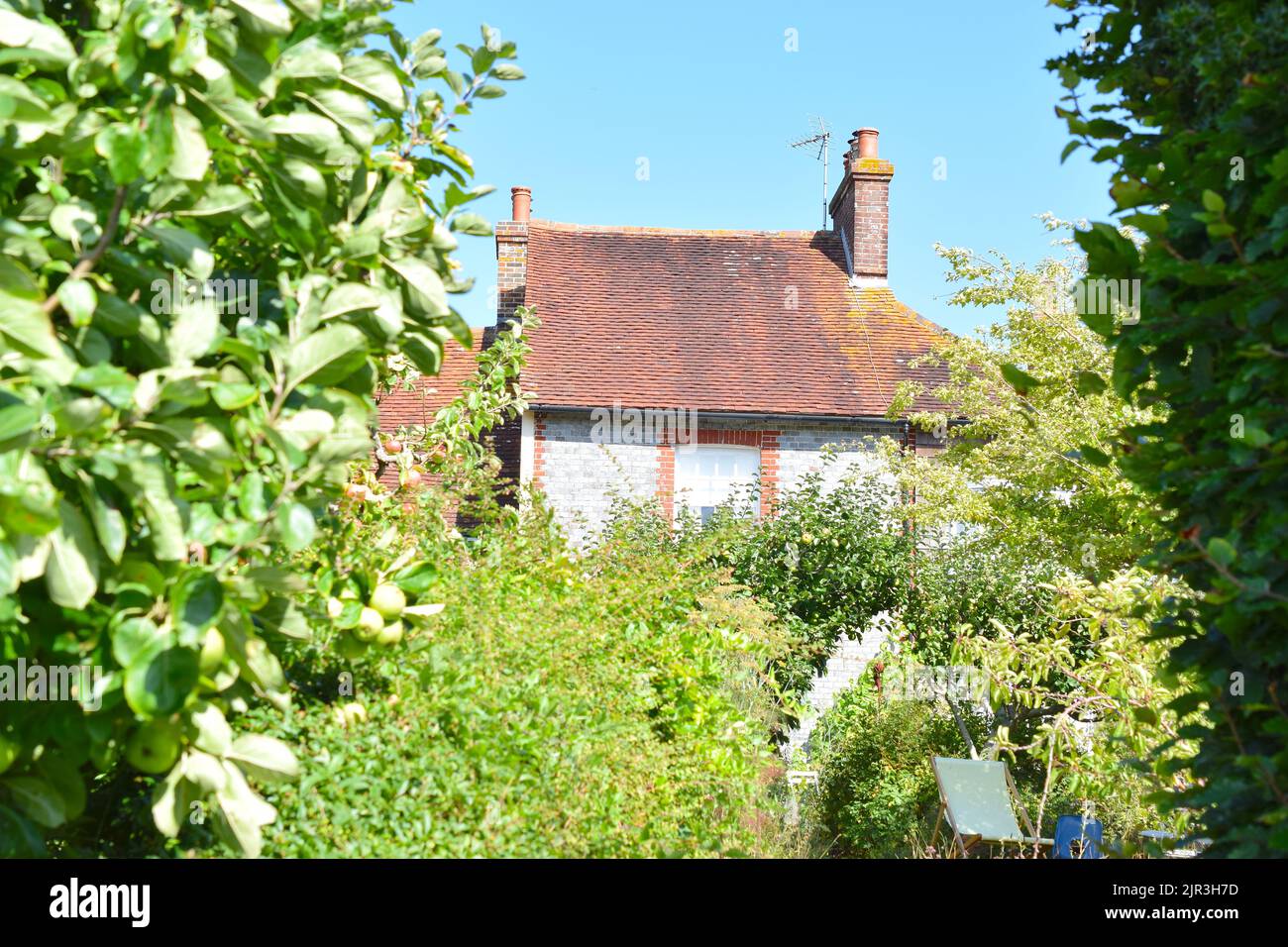 Old English house and garden in Glynde village on a nice day Stock ...
