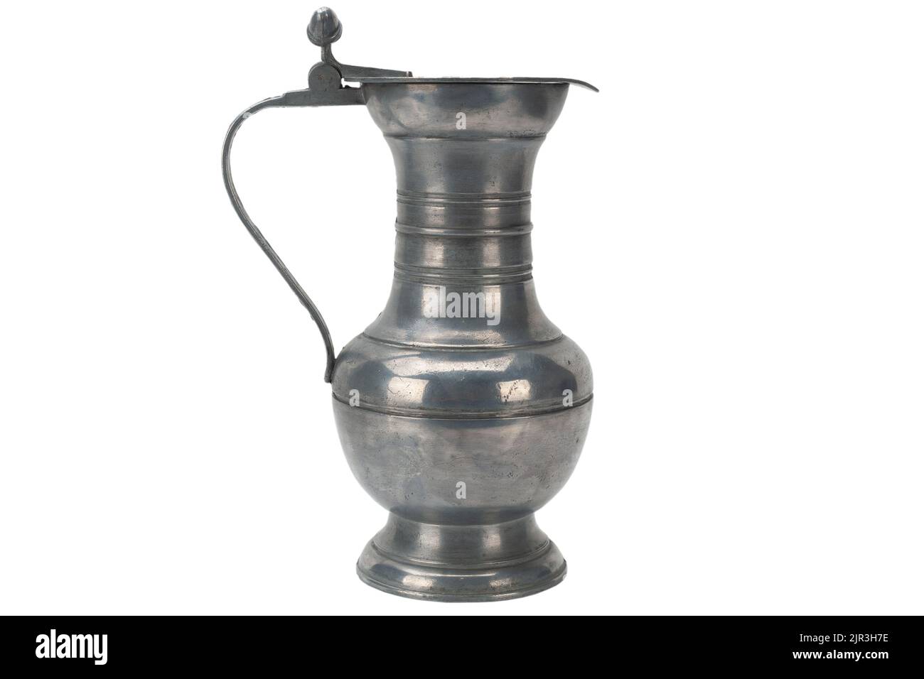 Vintage antique pewter water jug isolated on a white background Stock ...