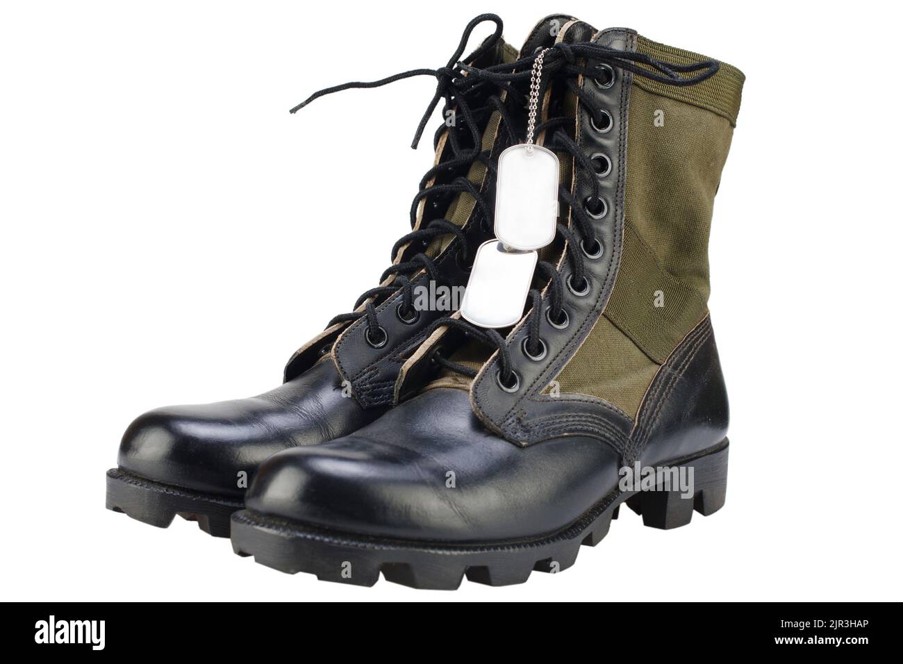 New brand US army pattern jungle boots with dog tags isolated on white ...