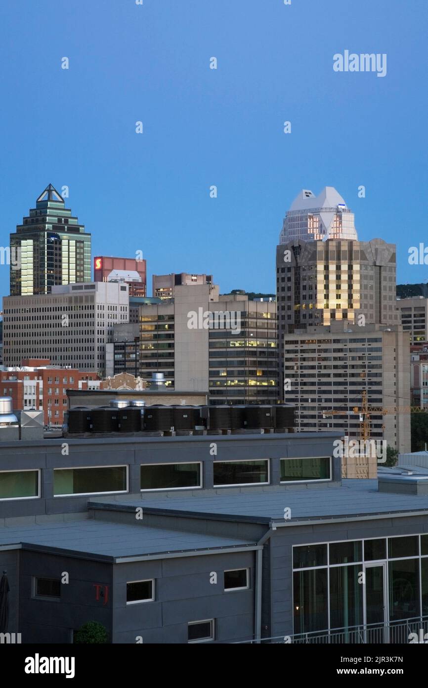 Modern office buildings at dawn with the lights turned on, Montreal ...