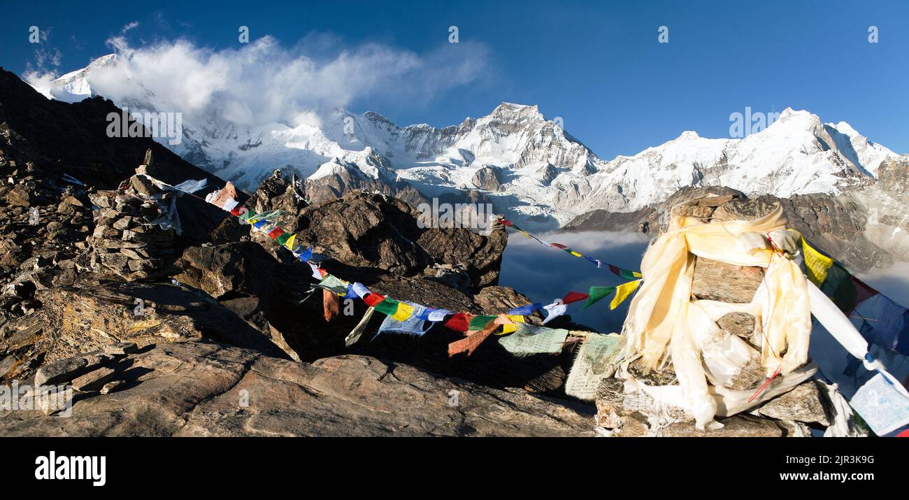 Panoramic view of mount Cho Oyu and mount Gyachung Kang with prayer ...