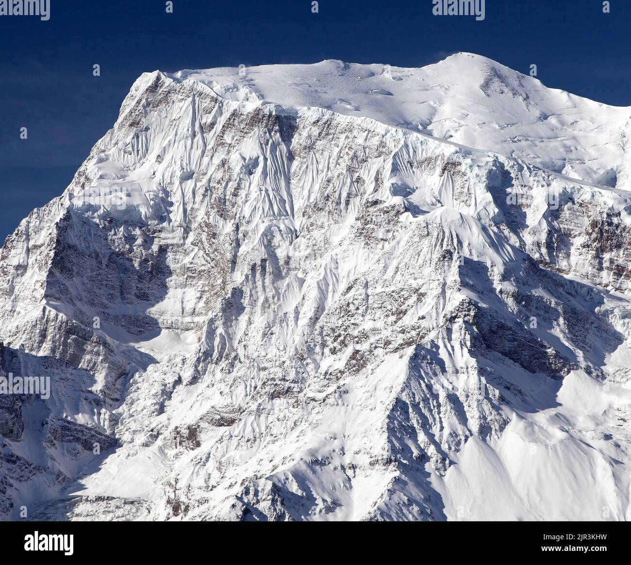 View of south rock face of mount Annapurna 3 III, Annapurna range ...