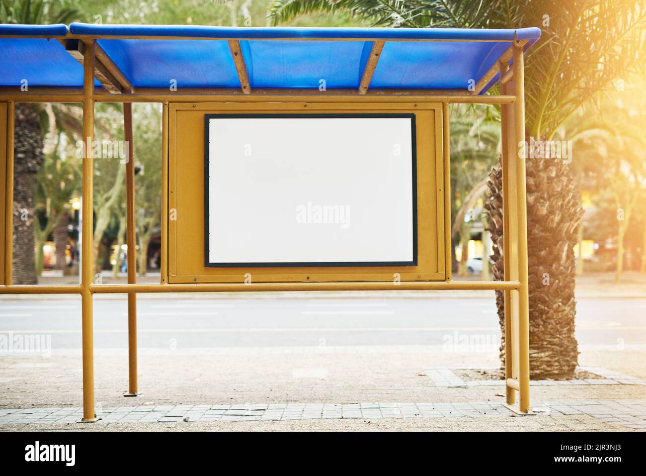 Put your message in front of a big audience. a blank poster on a bus ...