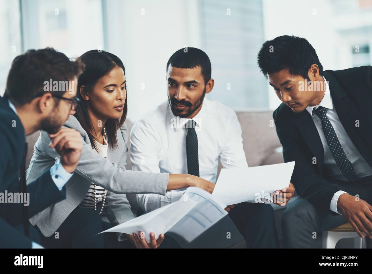Professional businesspeople discussing together in hi-res stock ...