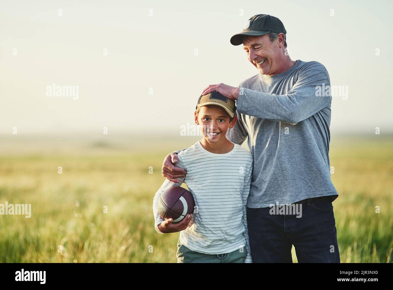 Father and son playing football hi-res stock photography and images - Alamy