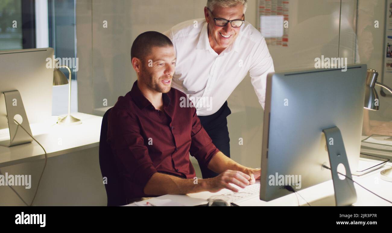 Two businessmen working computer hi-res stock photography and images ...