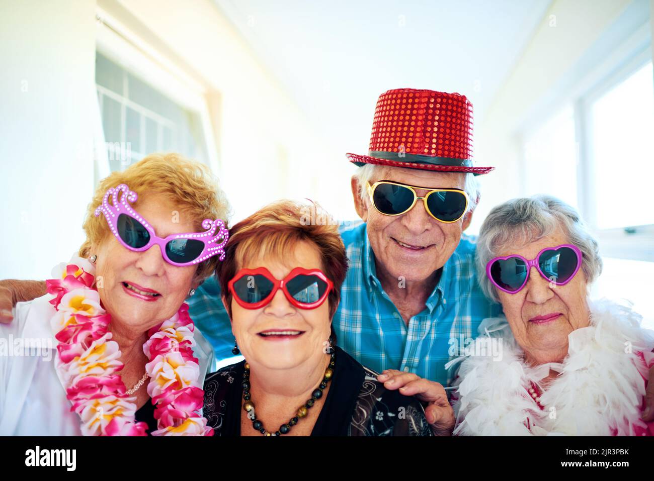 We are a real live bunch. a group carefree elderly people wearing ...