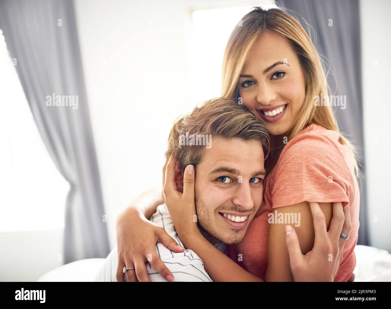 Couple hug bed hi-res stock photography and images - Alamy