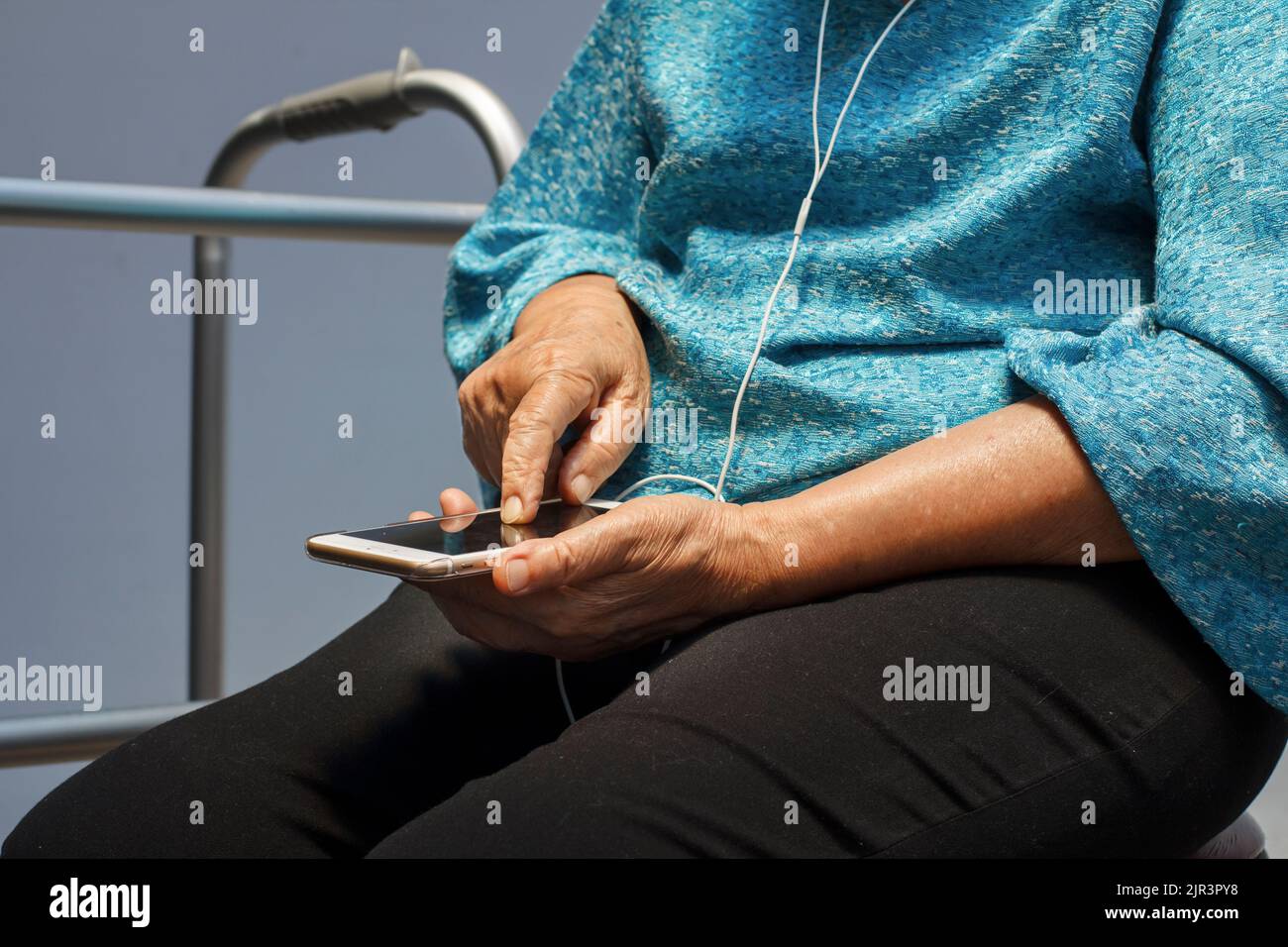 Mature woman using walker hi-res stock photography and images - Alamy