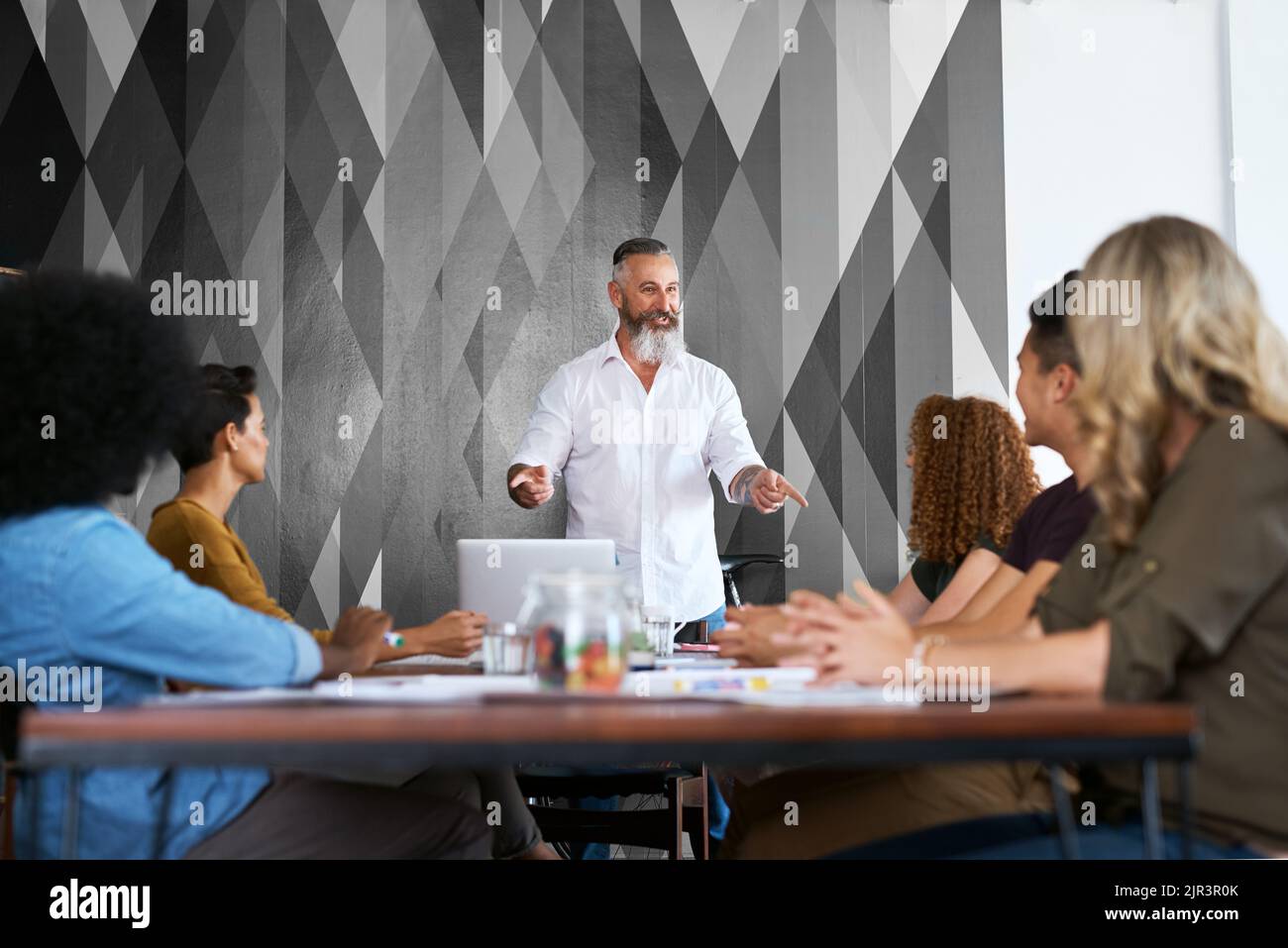 His presentations are always interesting and informative. a handsome ...