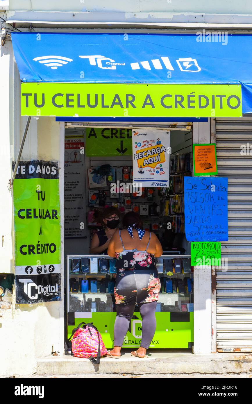 Mobile phone being sold at credit , Merida , Mexico Stock Photo - Alamy