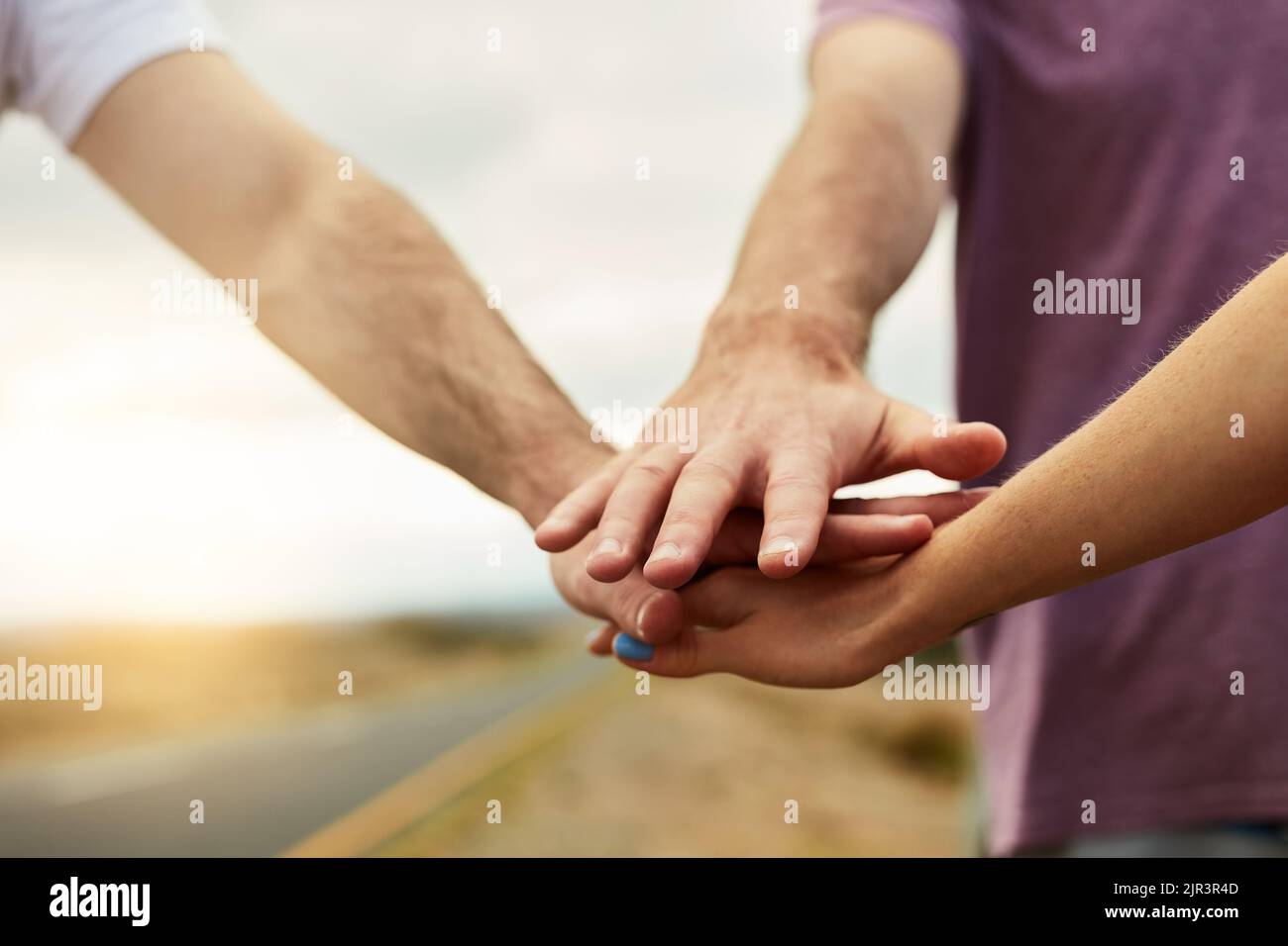 The three of us are stuck like glue. a group young unrecognizable ...