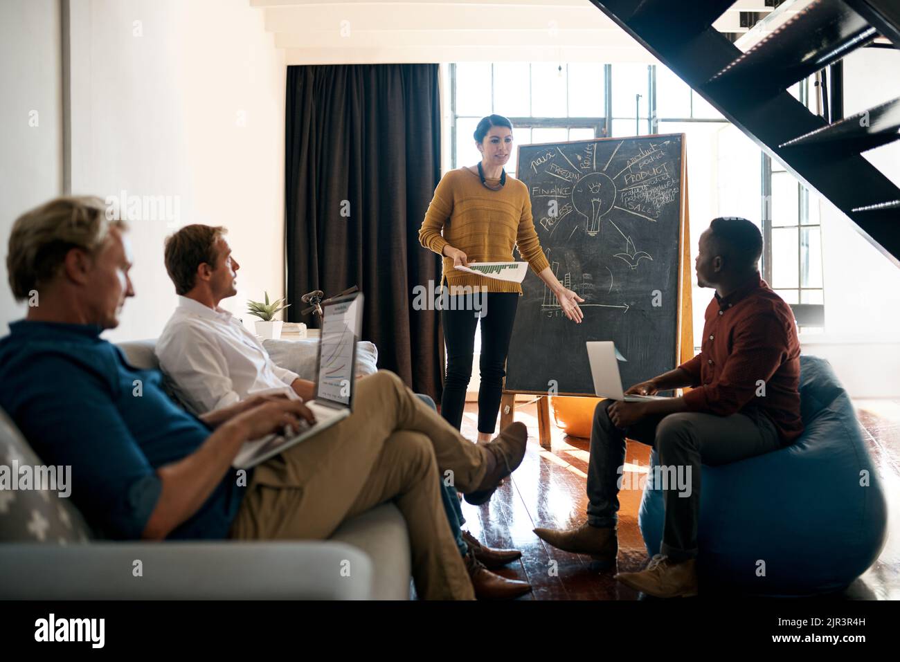 Making big plans for big results. a businesswoman giving a presentation ...