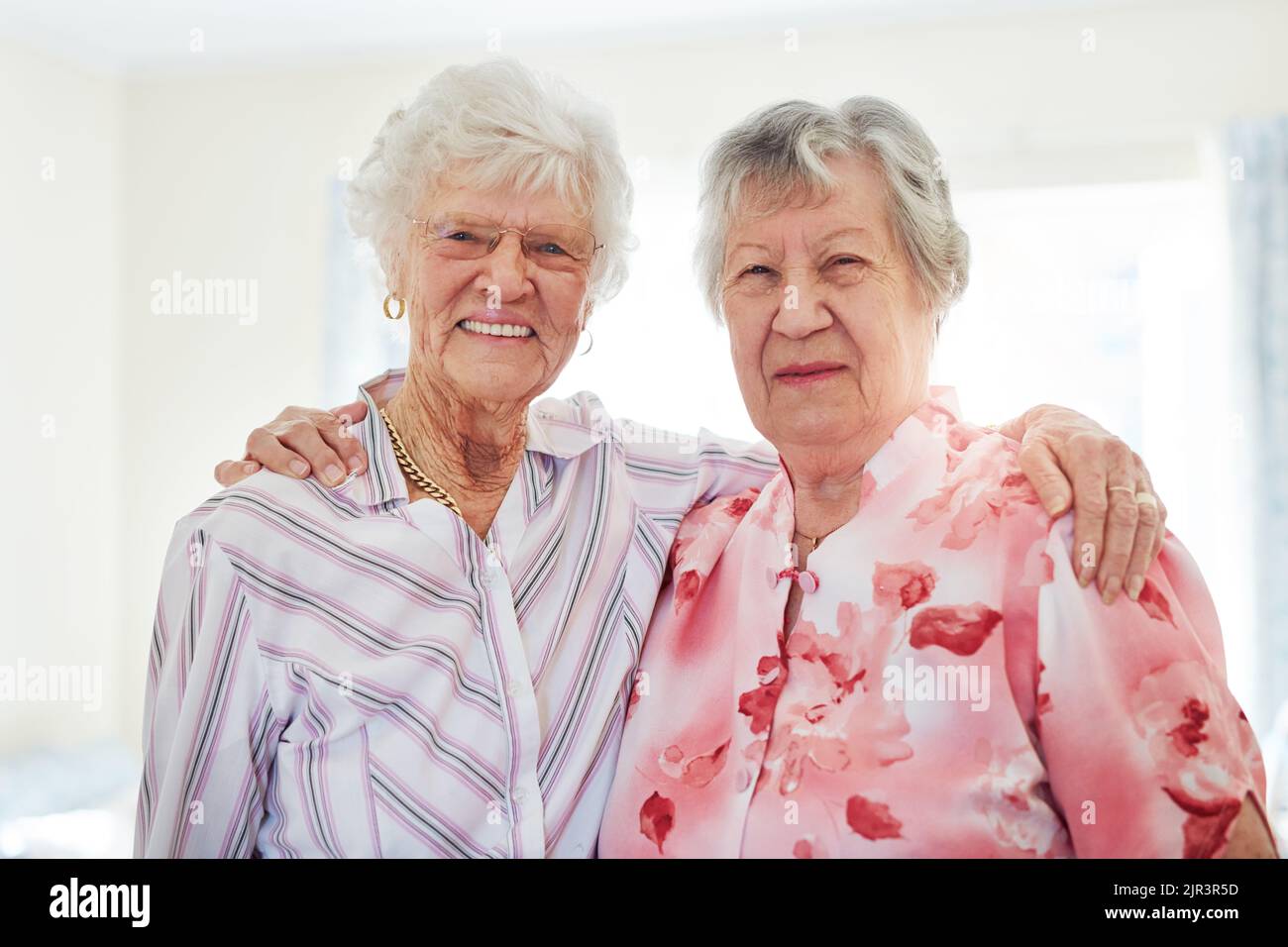 Time together means so much to us. Portrait of two happy elderly women ...
