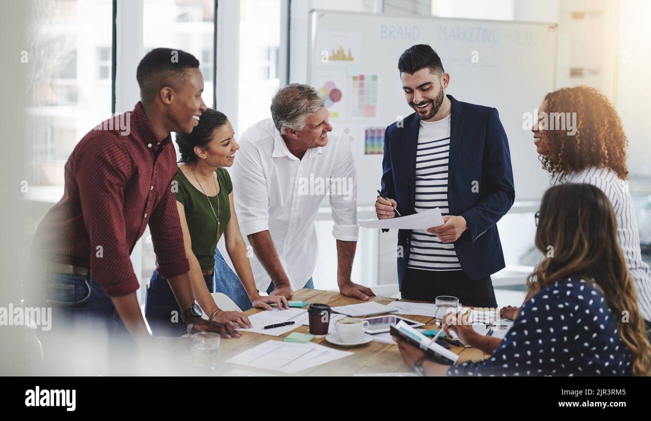 Anything is possible with a great team. creative employees working in a ...