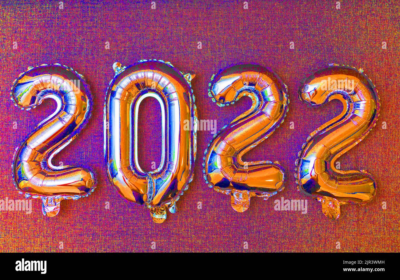 new year 2022 shiny silver balloons on colourful background Stock Photo ...