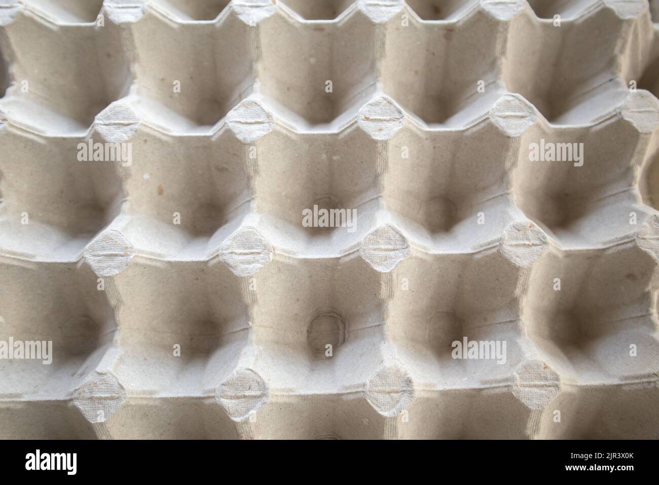 Top view of an empty cardboard egg tray. Background texture of a ...