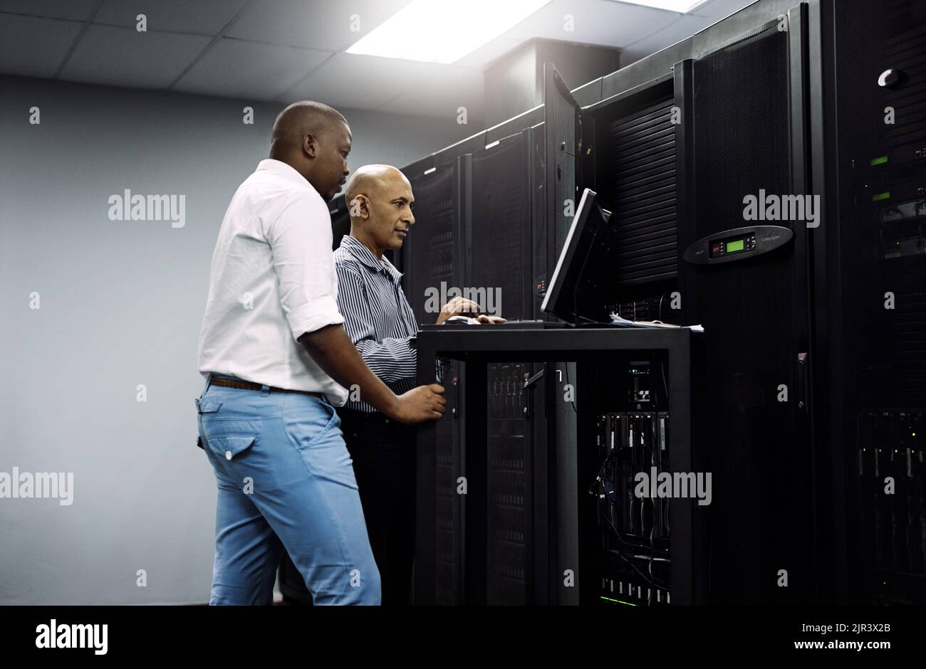 Having a healthy server is integral to business. two IT technicians ...