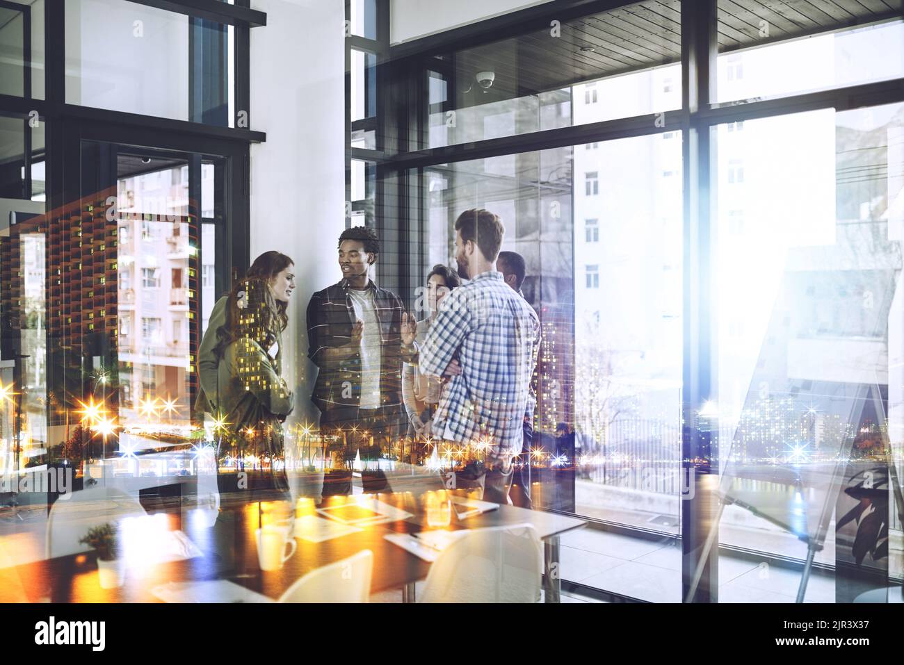 Great minds at work. Multiple exposure shot of businesspeople ...