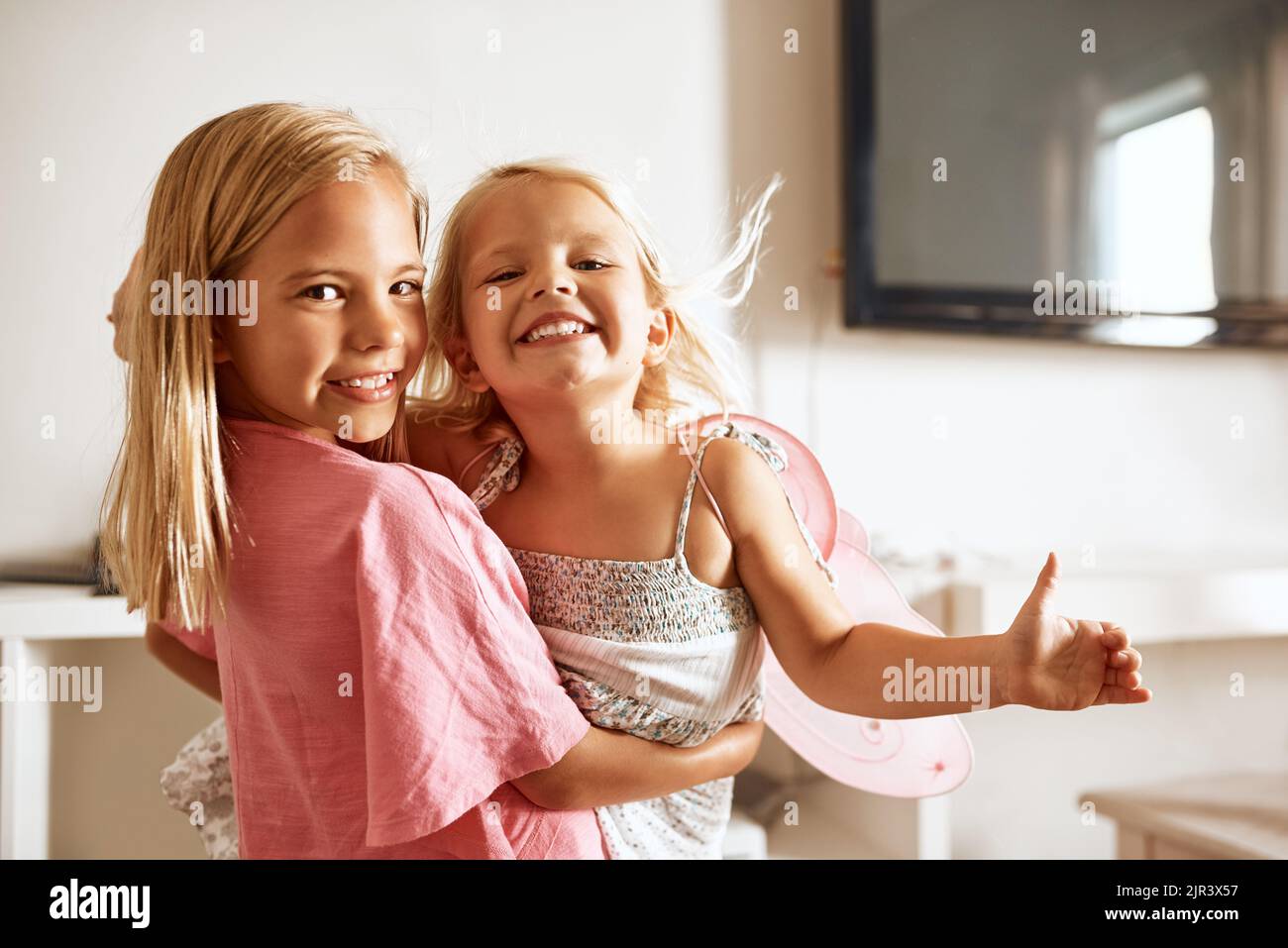 Sisters make the bestest friends. Portrait of two little sisters having ...