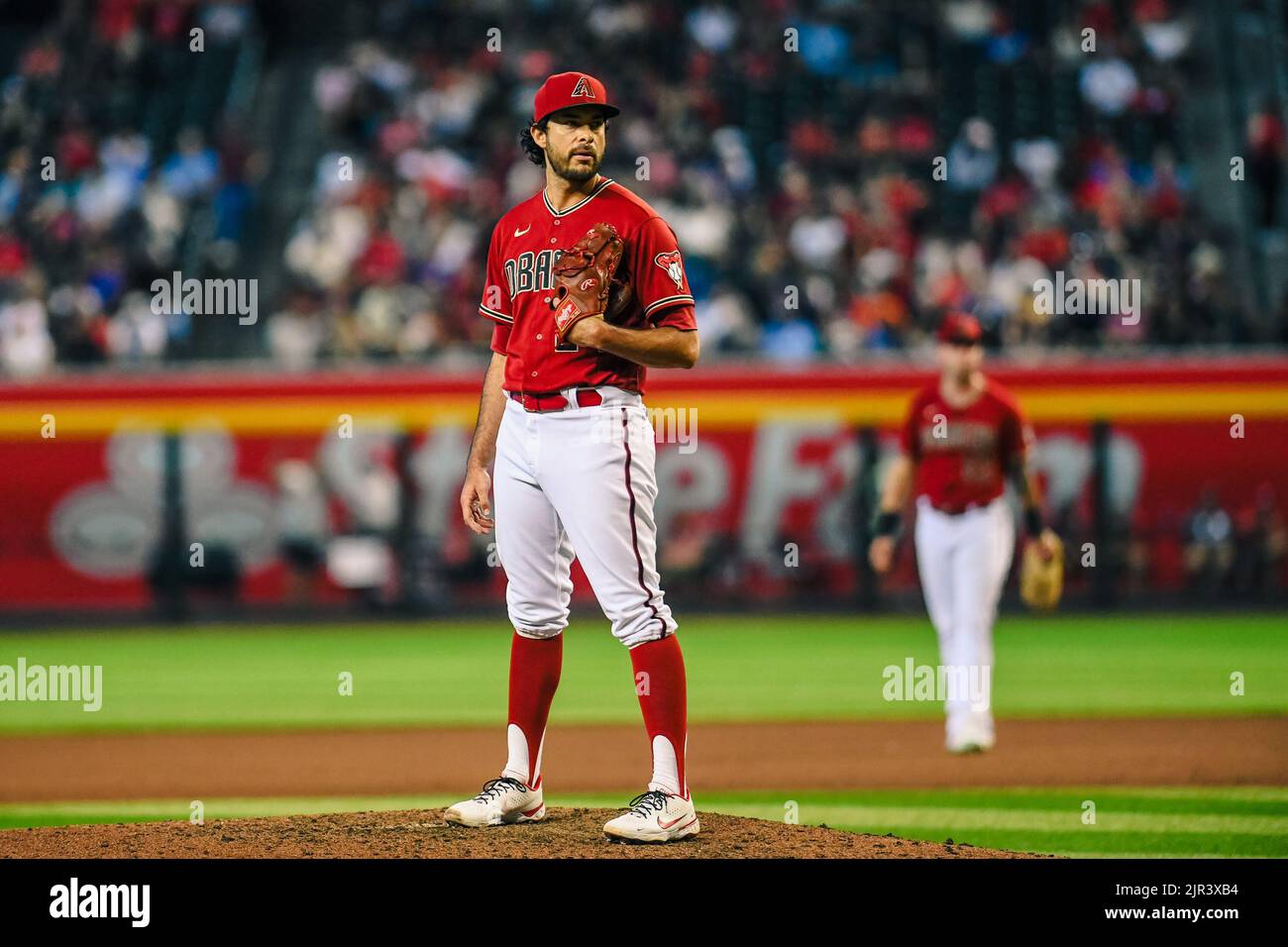 Arizona Diamondbacks pitcher Noe Ramirez (24) throws against the St ...