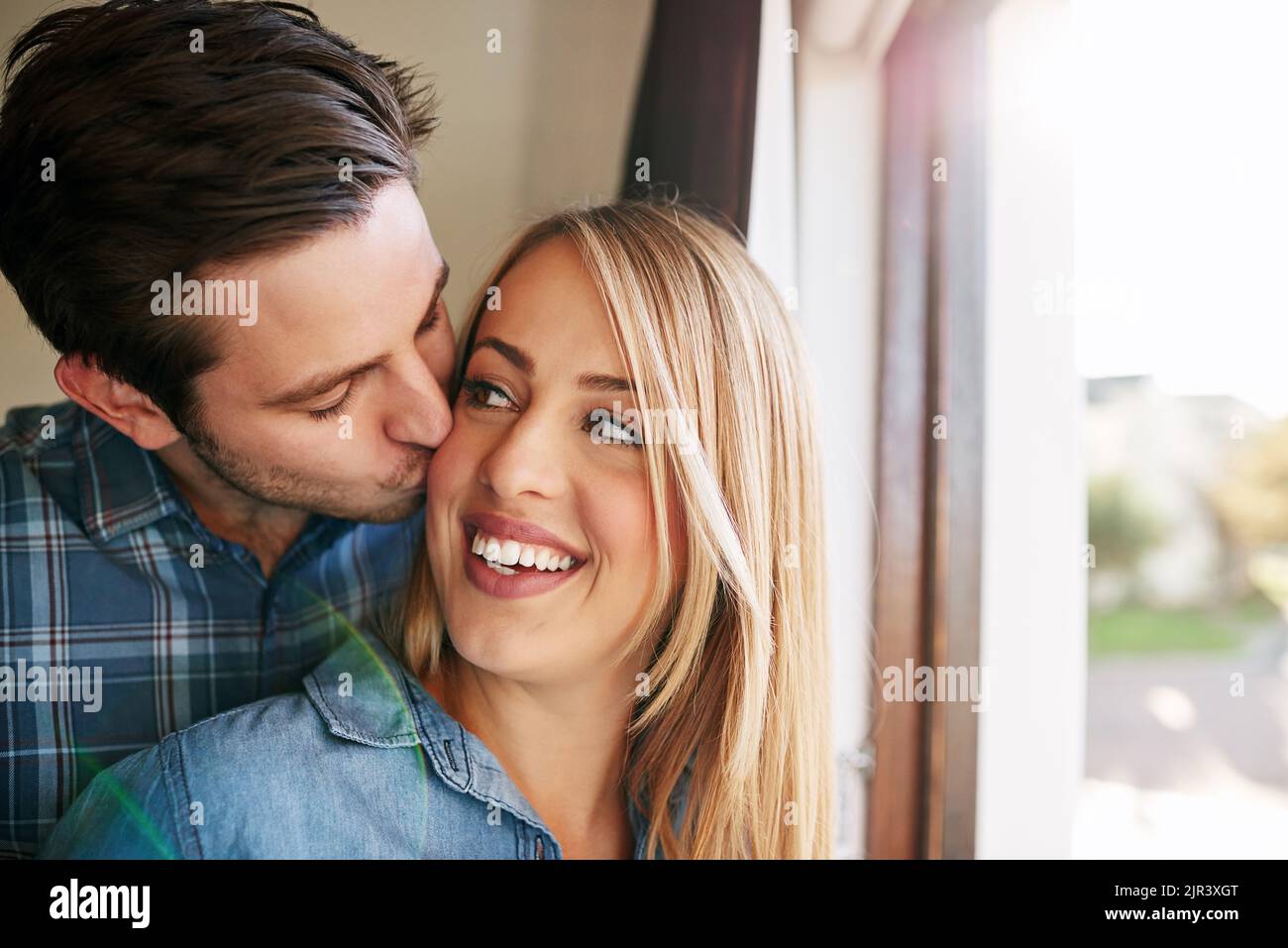 Fill everyday with love. an affectionate young couple standing at a ...