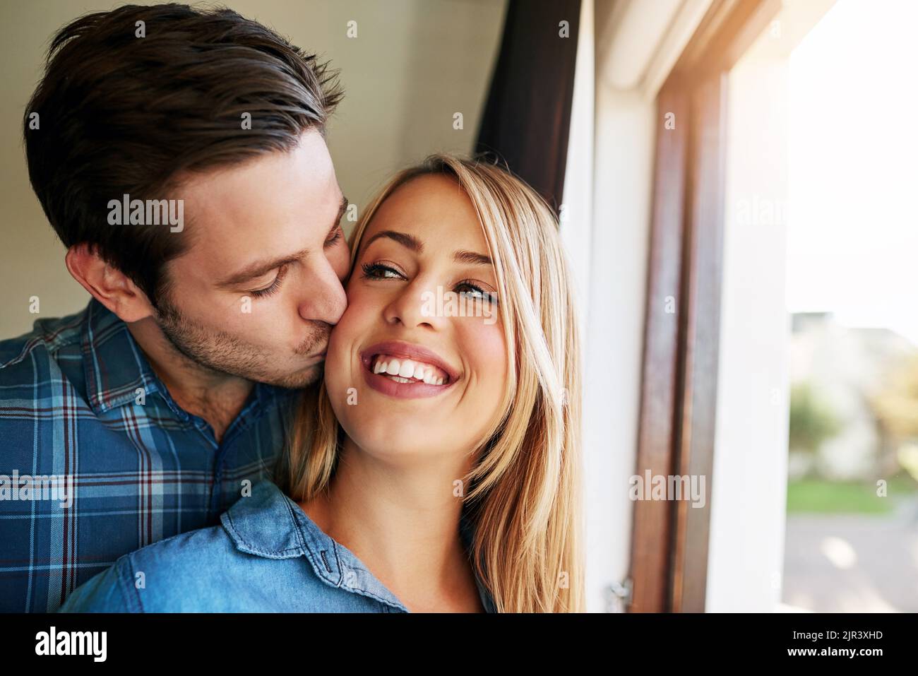 Love is an important part of their day. an affectionate young couple ...