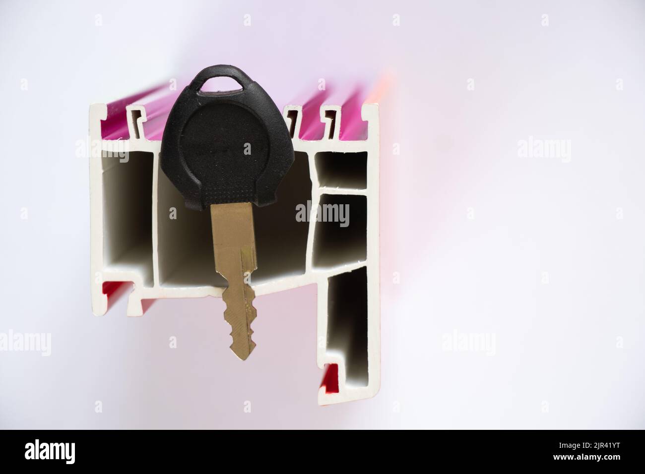 aluminum window frame as a sample and keys to the lock, sectional ...