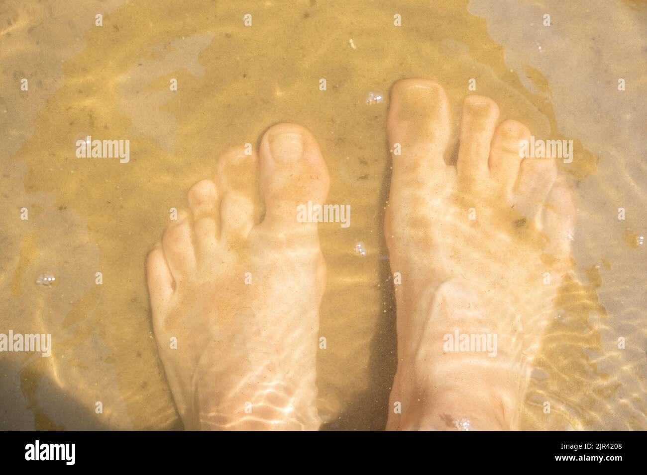 Feet in river hi-res stock photography and images - Alamy