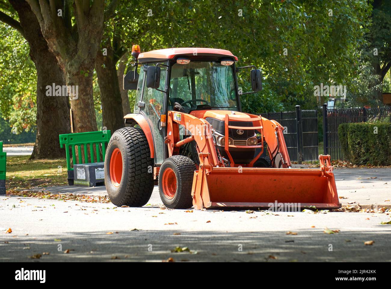 Orange council digger parked on a road in Nottingham, UK Stock Photo ...