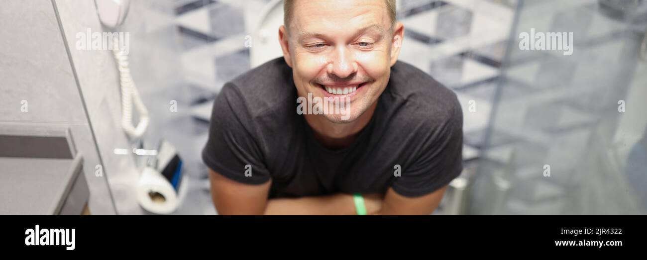 Man on the toilet hi-res stock photography and images - Alamy