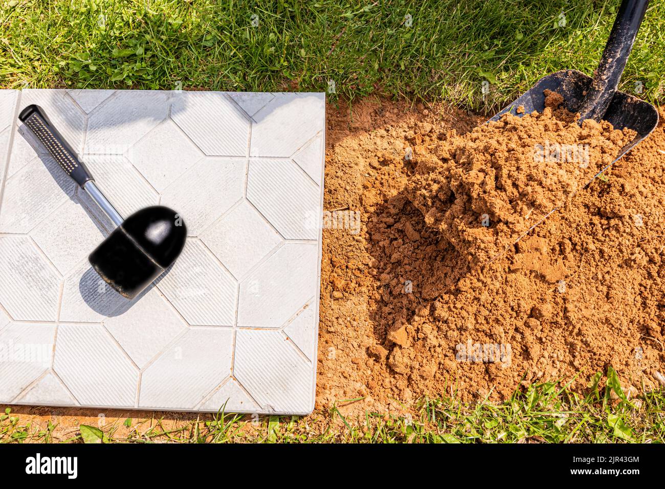 rubber construction hammer for laying paving or garden tiles in the ...