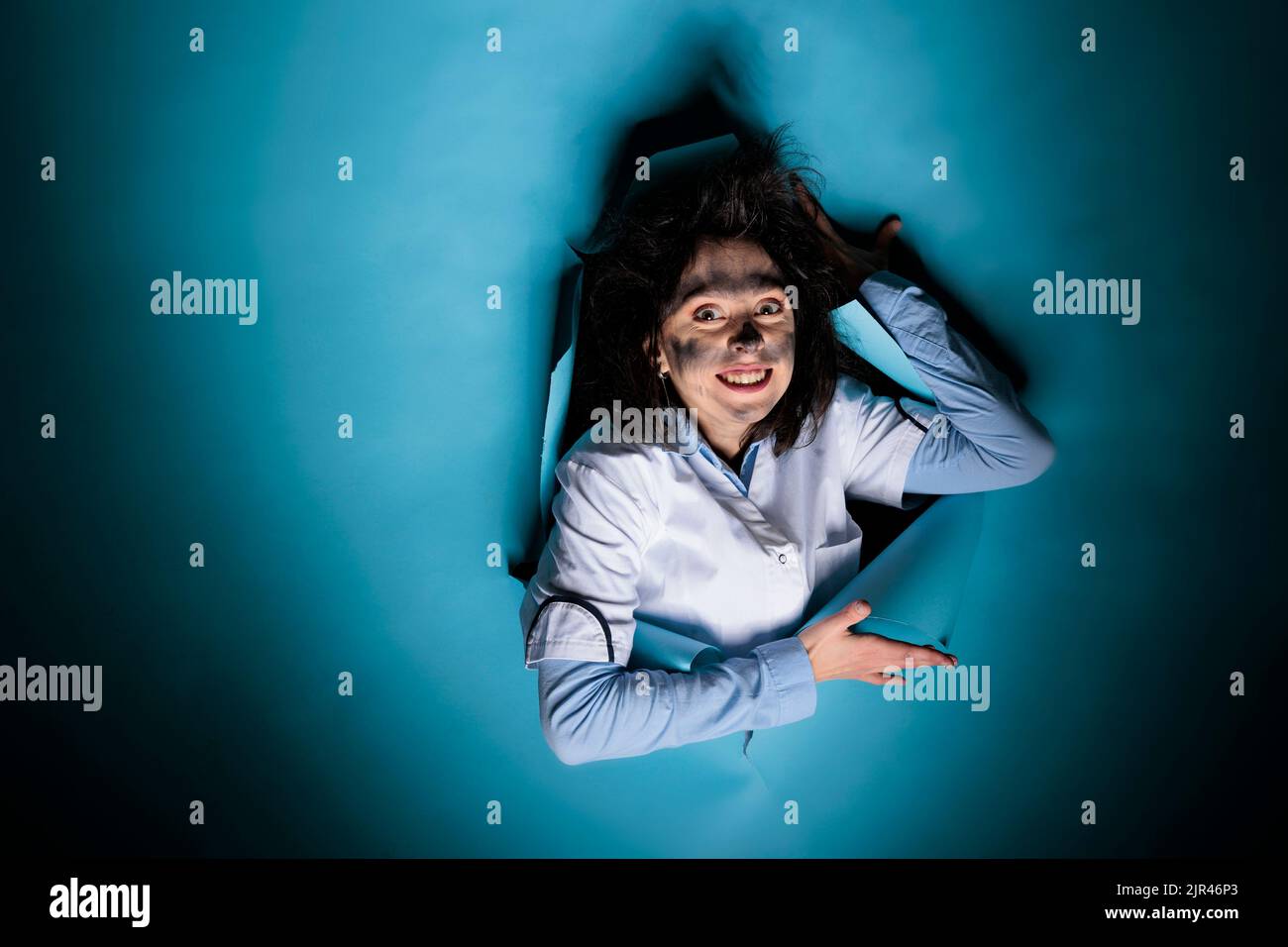 Insane scientist expert with amusing face expression and messy hair ...