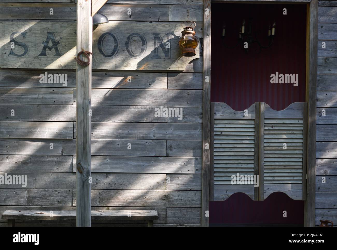 An old wooden door in a saloon in the wild west Stock Photo - Alamy