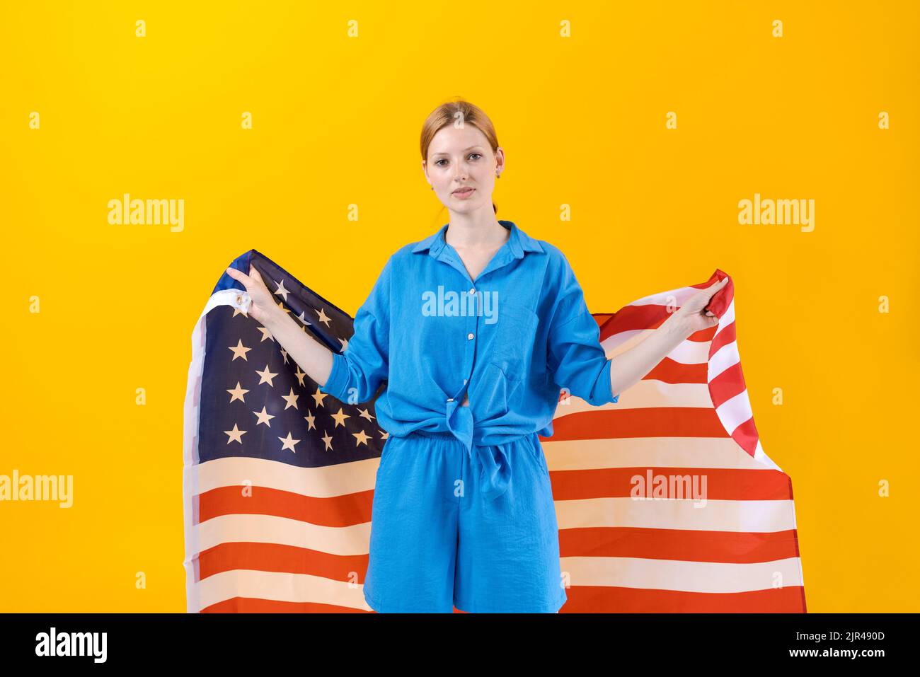 Celebration Independence Day. Stars and stripes. Young woman holding ...