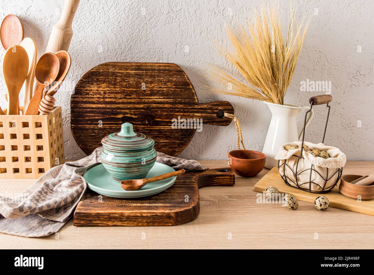 wooden countertop of the kitchen farmhouse with various kitchen ...