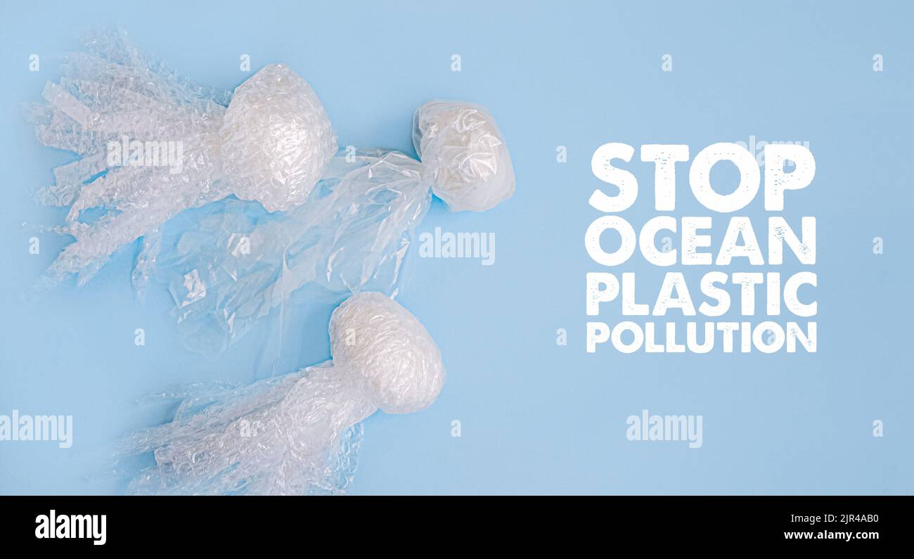 Sea and ocean life from waste. Jellyfishes out of plastic waste on blue ...