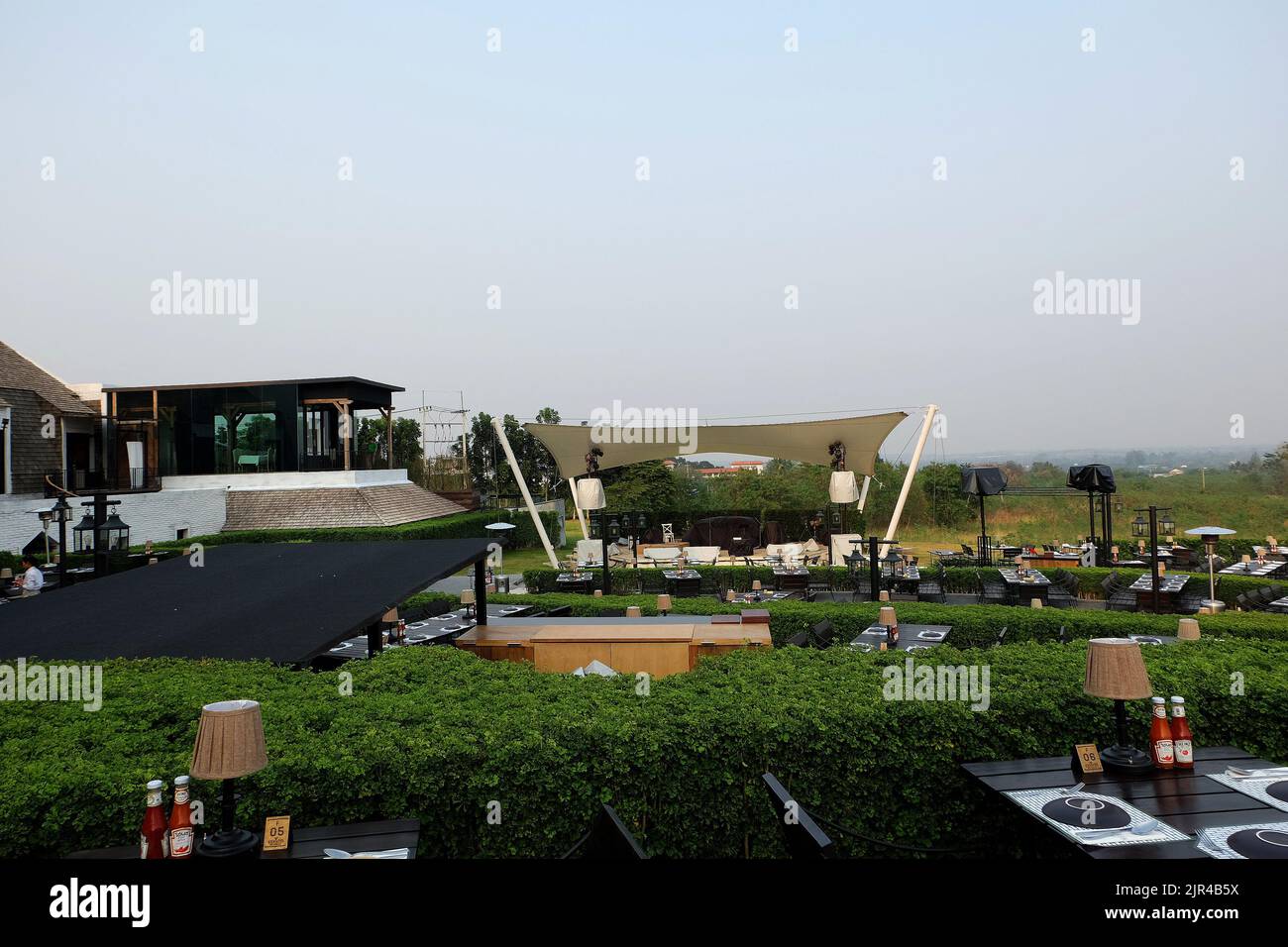 Exterior architecture and outdoor patio and dining area design of local ...