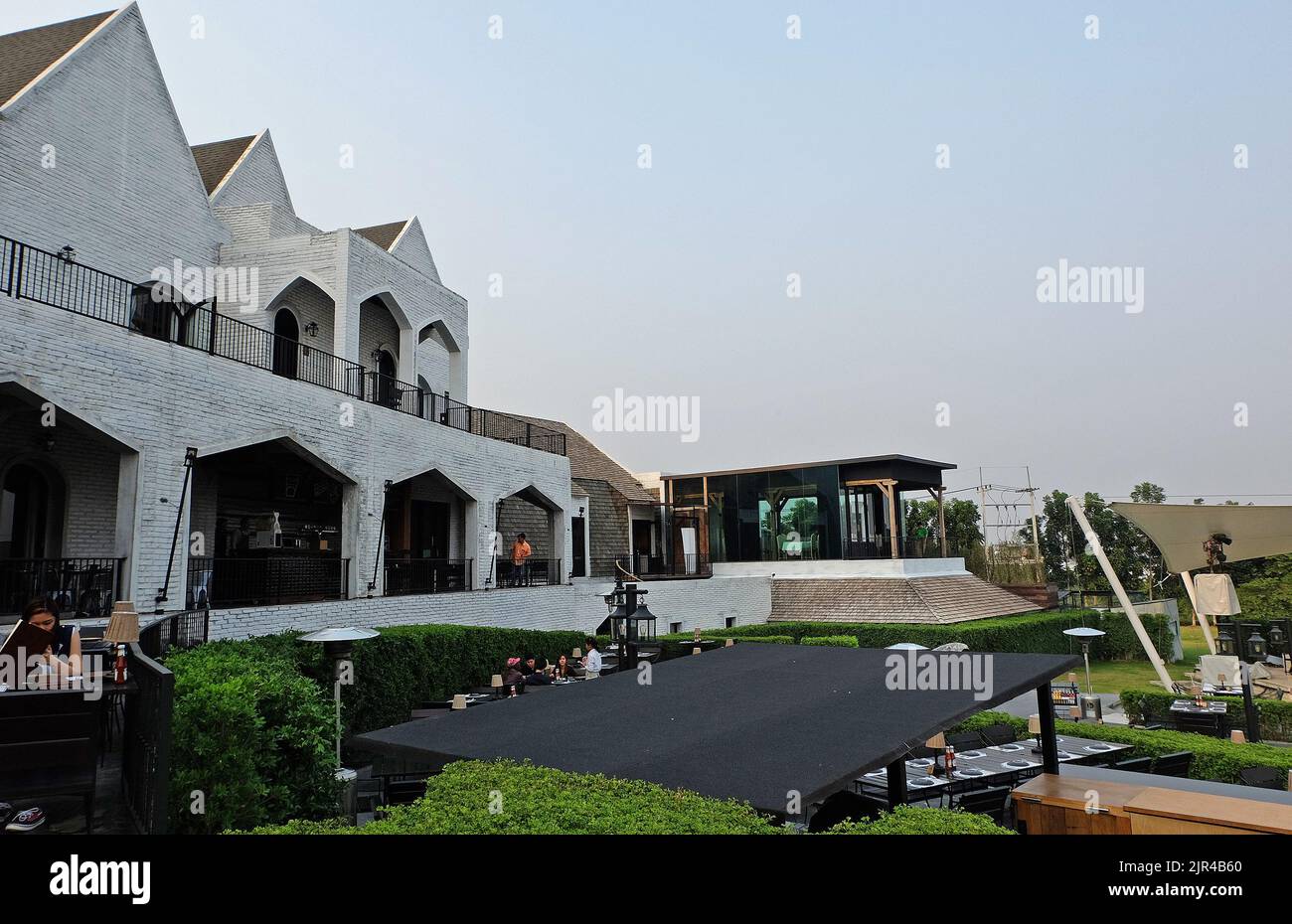 Exterior architecture and outdoor patio and dining area design of local ...