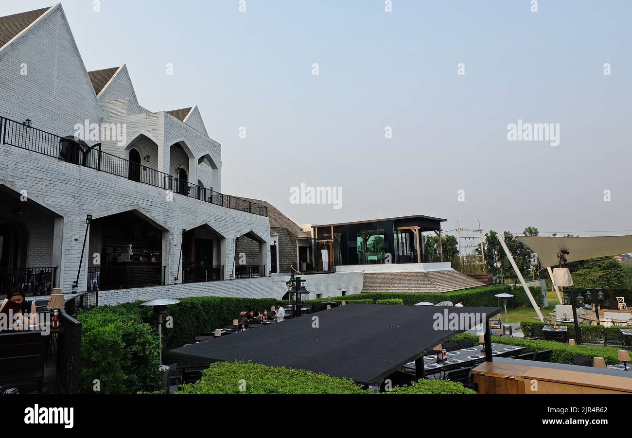 Exterior architecture and outdoor patio and dining area design of local ...