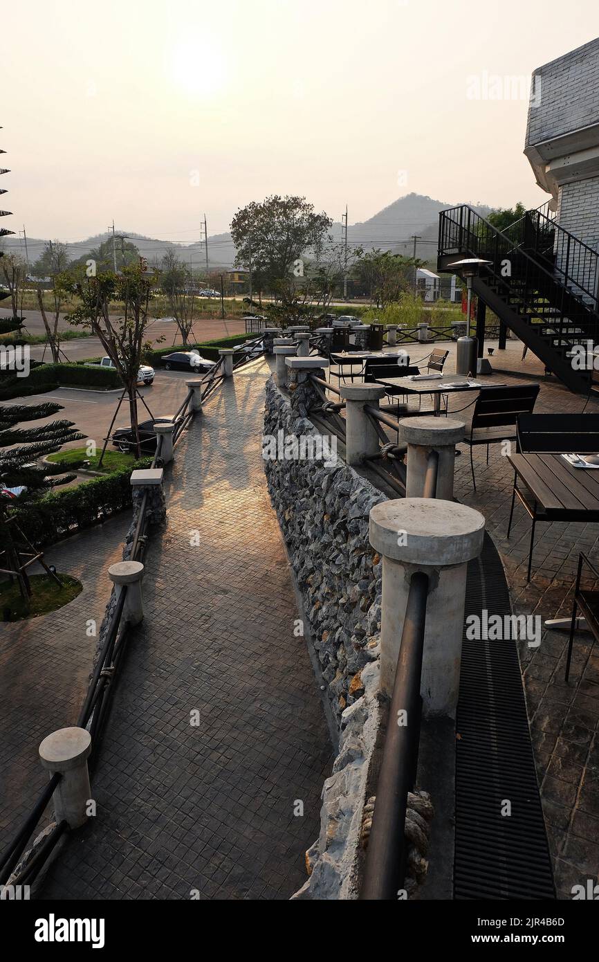 Exterior architecture and outdoor patio and dining area design of local ...