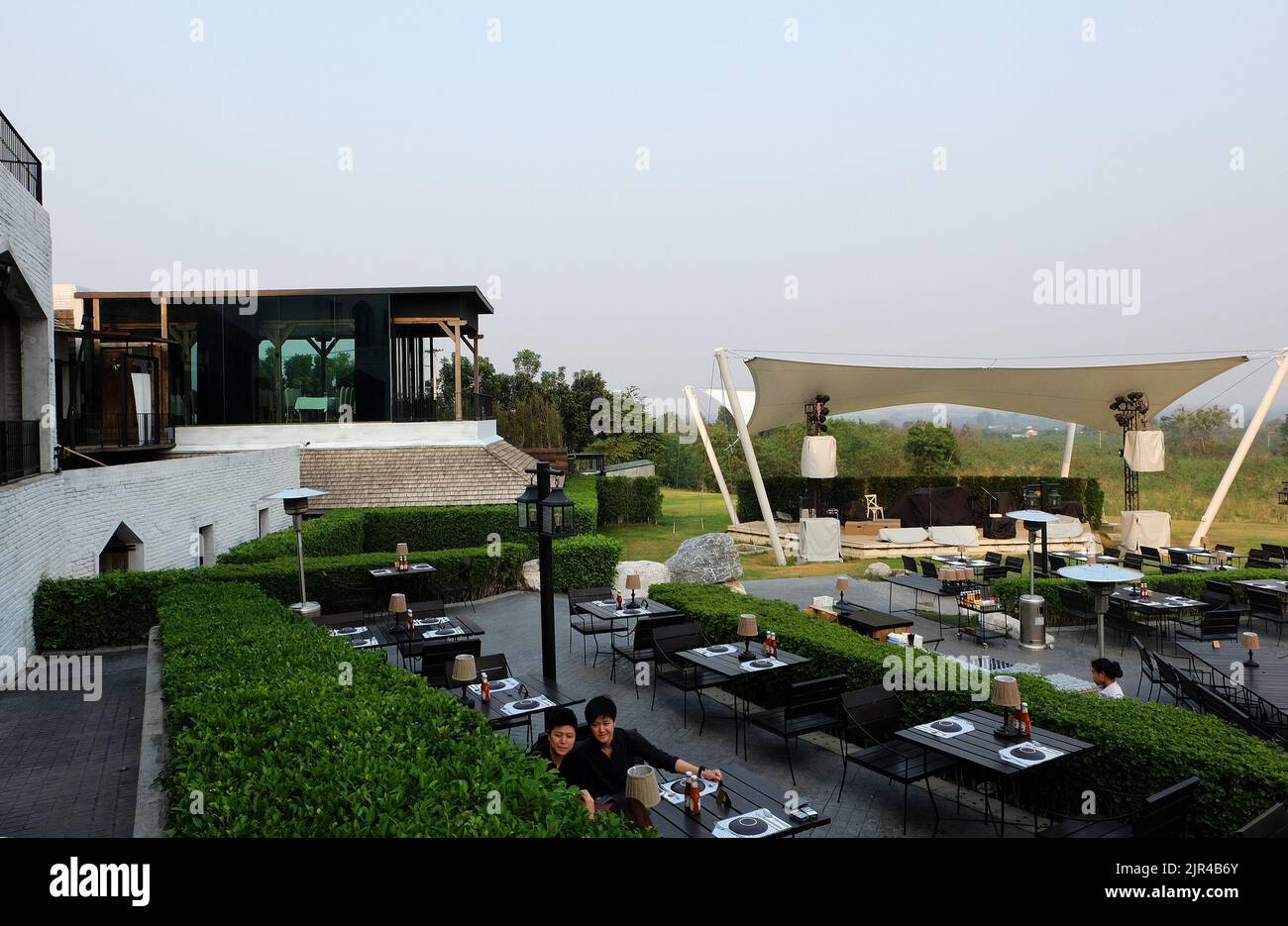 Exterior architecture and outdoor patio and dining area design of local ...