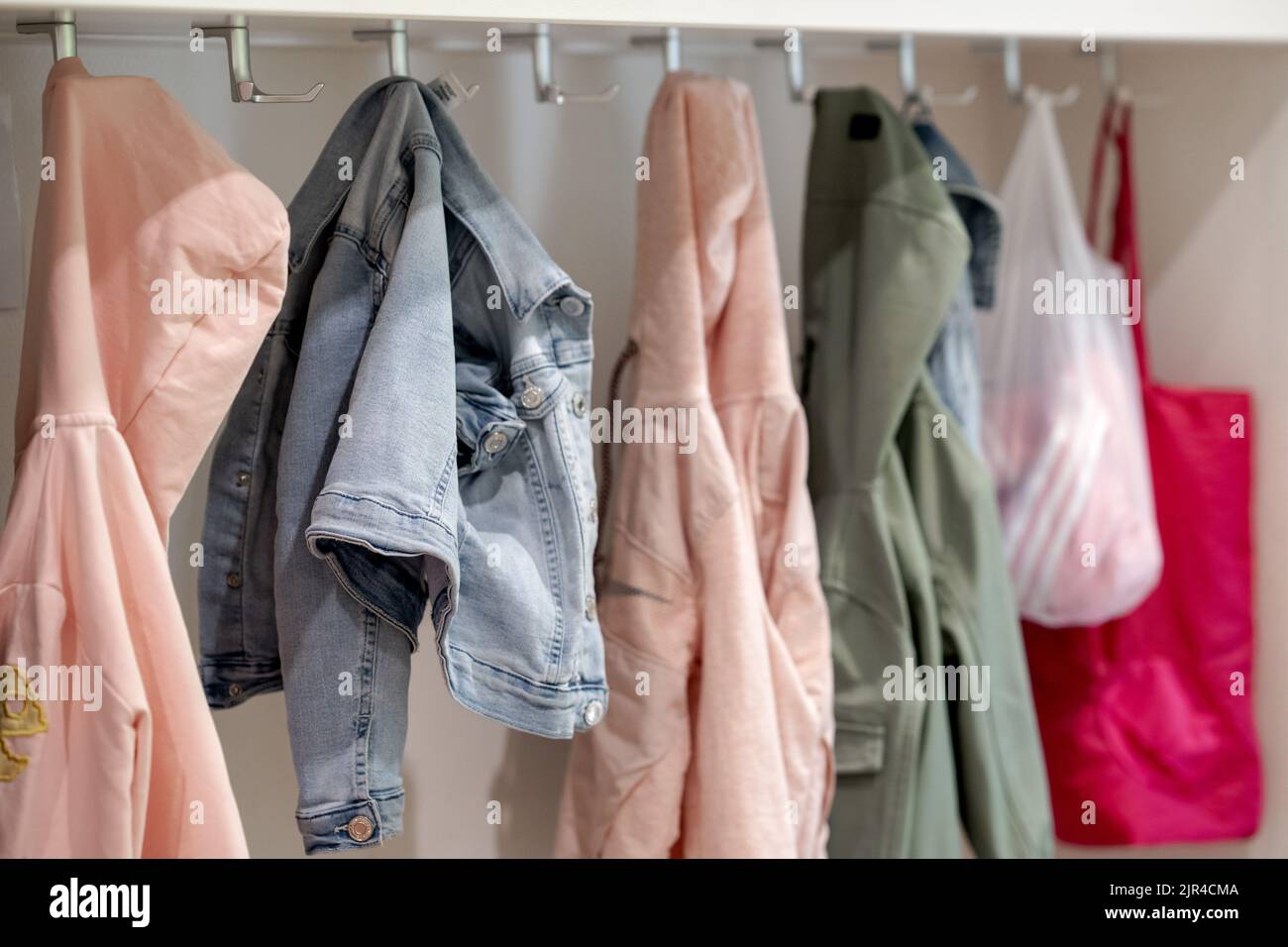 Hanging coats in classroom hi-res stock photography and images - Alamy