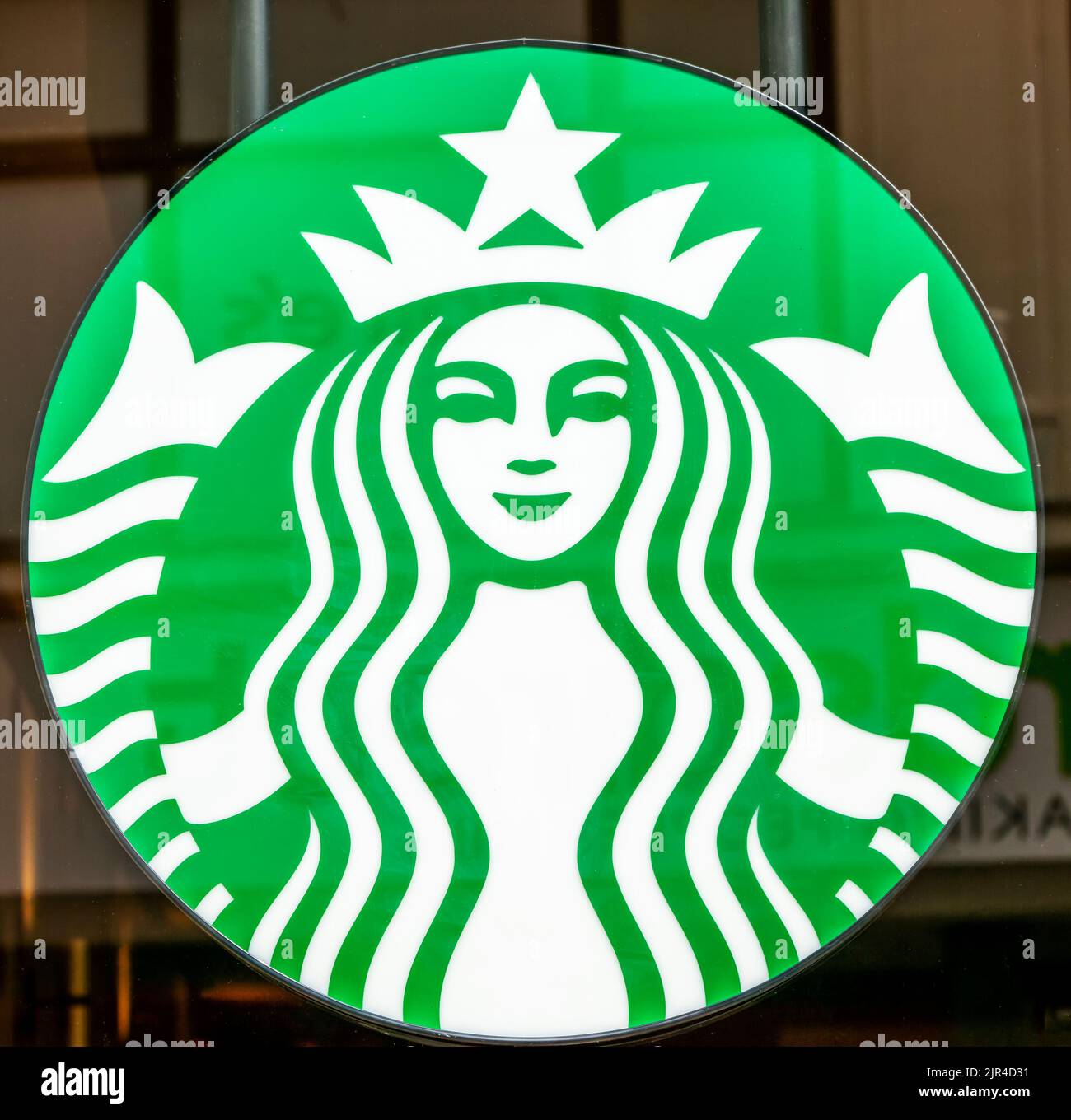 Close up of Starbucks twin-tailed siren brand logo sign, Ipswich ...