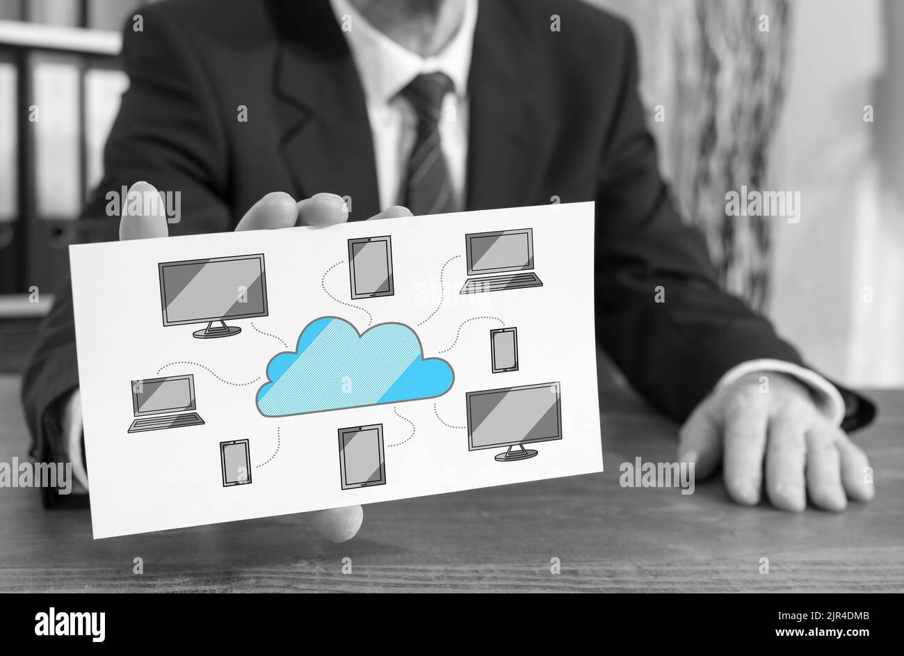 Businessman showing an index card with cloud computing concept Stock ...