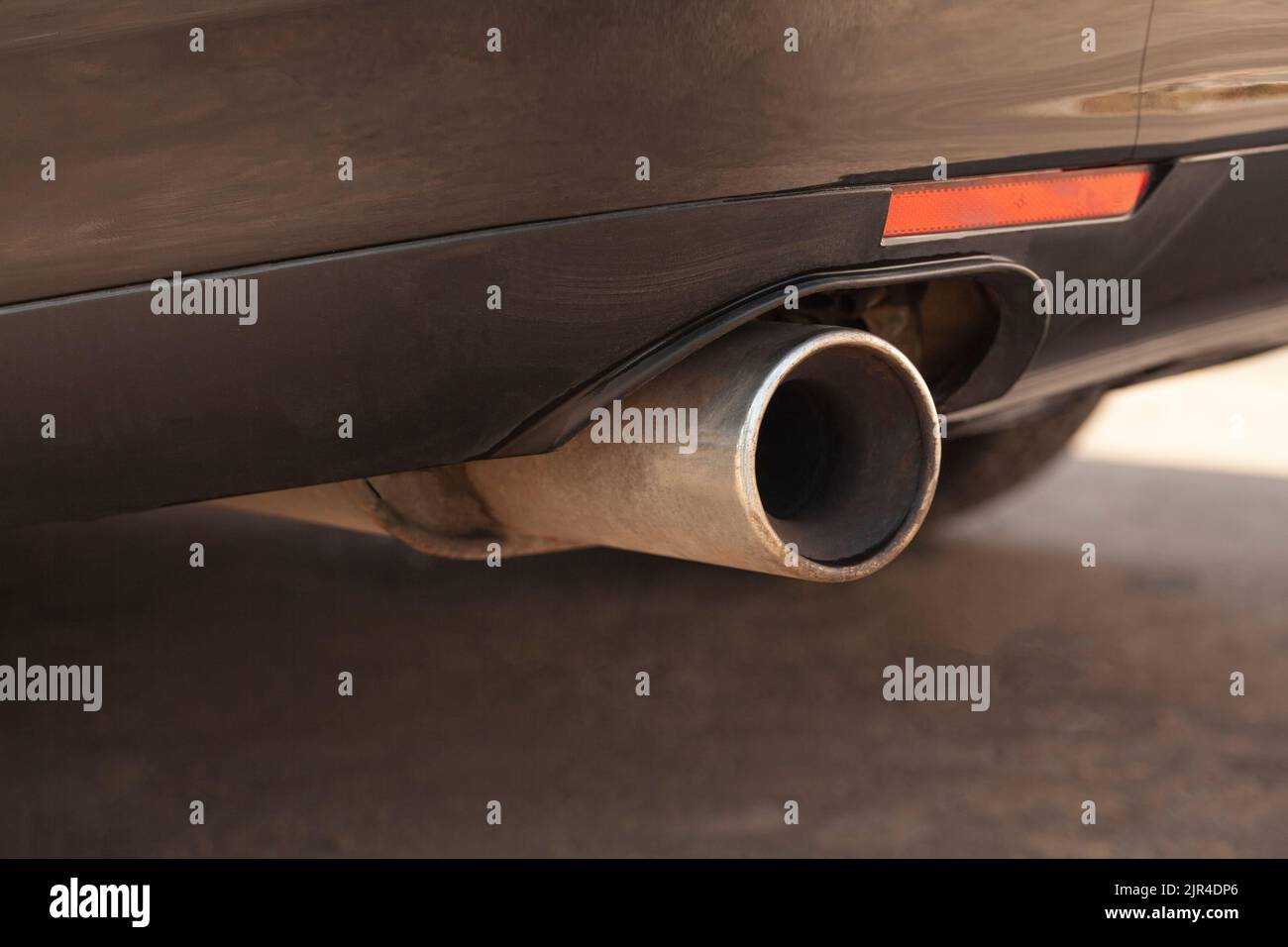 Car pipe exhaust muffler rejecting carbon dioxide Stock Photo - Alamy