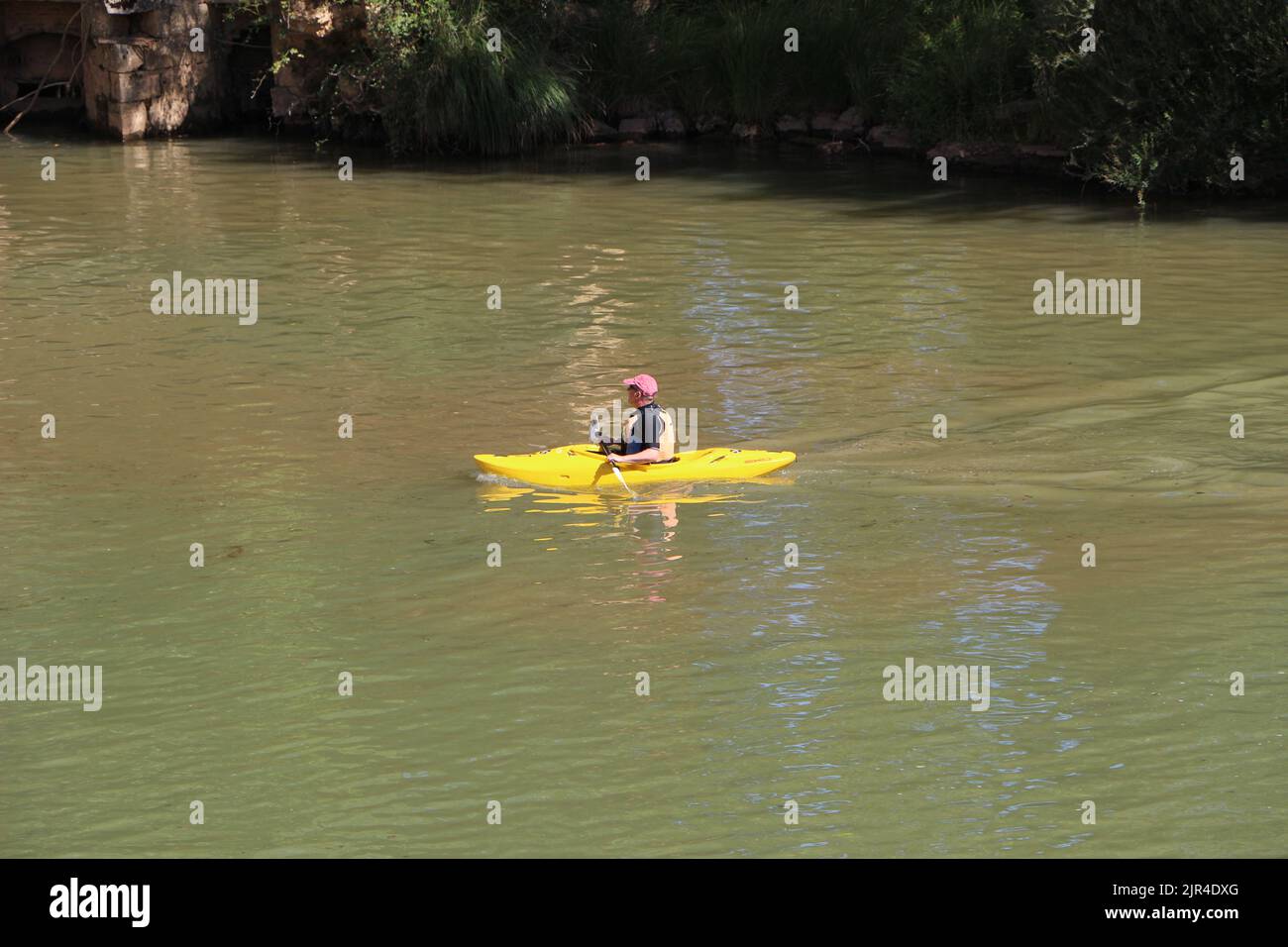 Small yellow canoe used by a lifeguard for the triathlon Pisuerga River ...