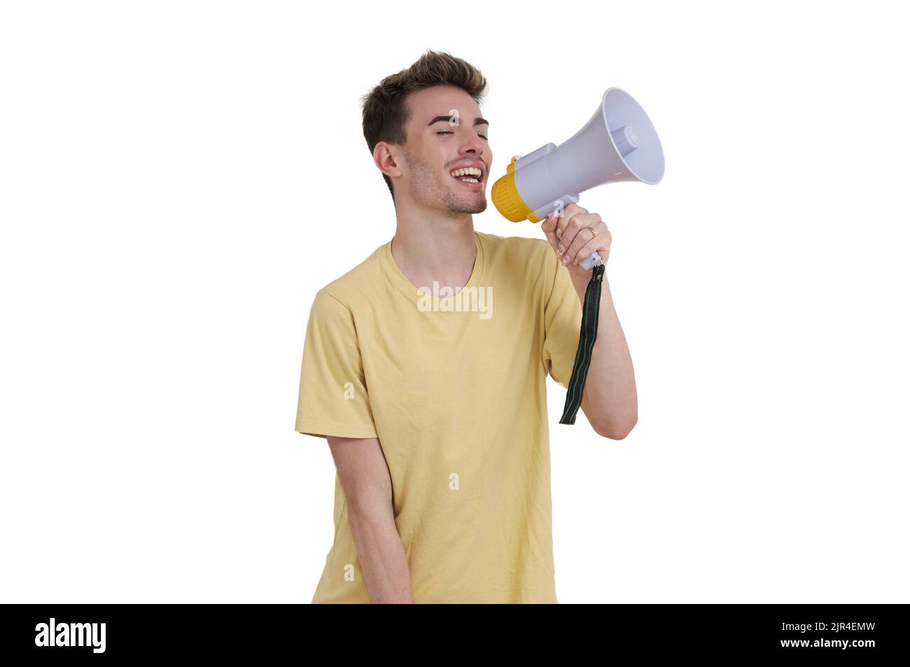 Young caucasian man shouting through megaphone, isolated Stock Photo ...