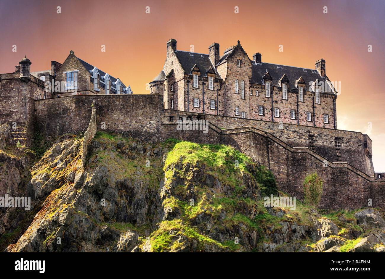 Scotland - Edinburgh Castle with green garden at dramatic sunset, UK ...